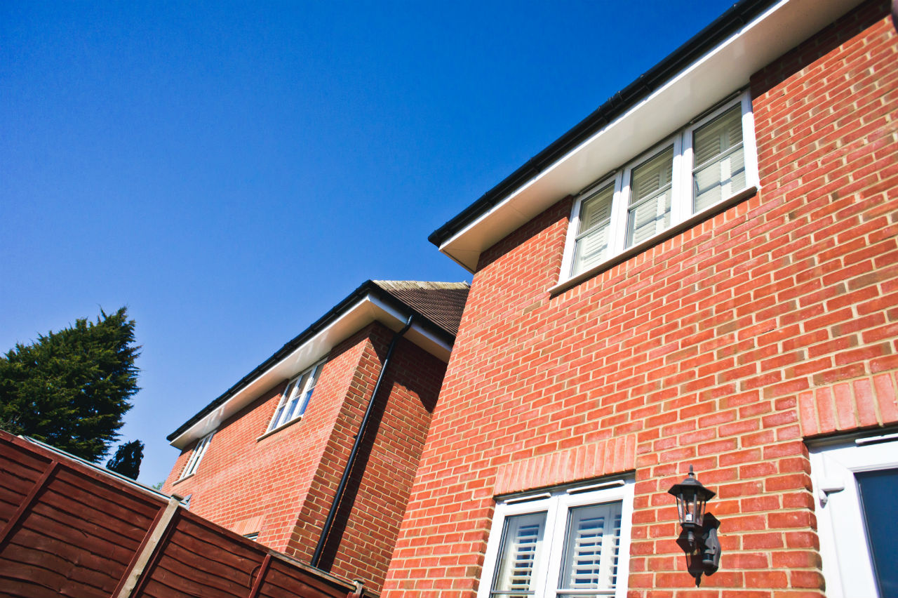 Matching Bricks and Windows in a Garage Conversion: Creating a Seamless ...